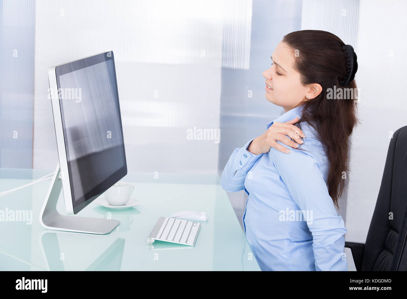 Young Businesswoman Using Computer Suffering From Neck Ache Stock Photo ...