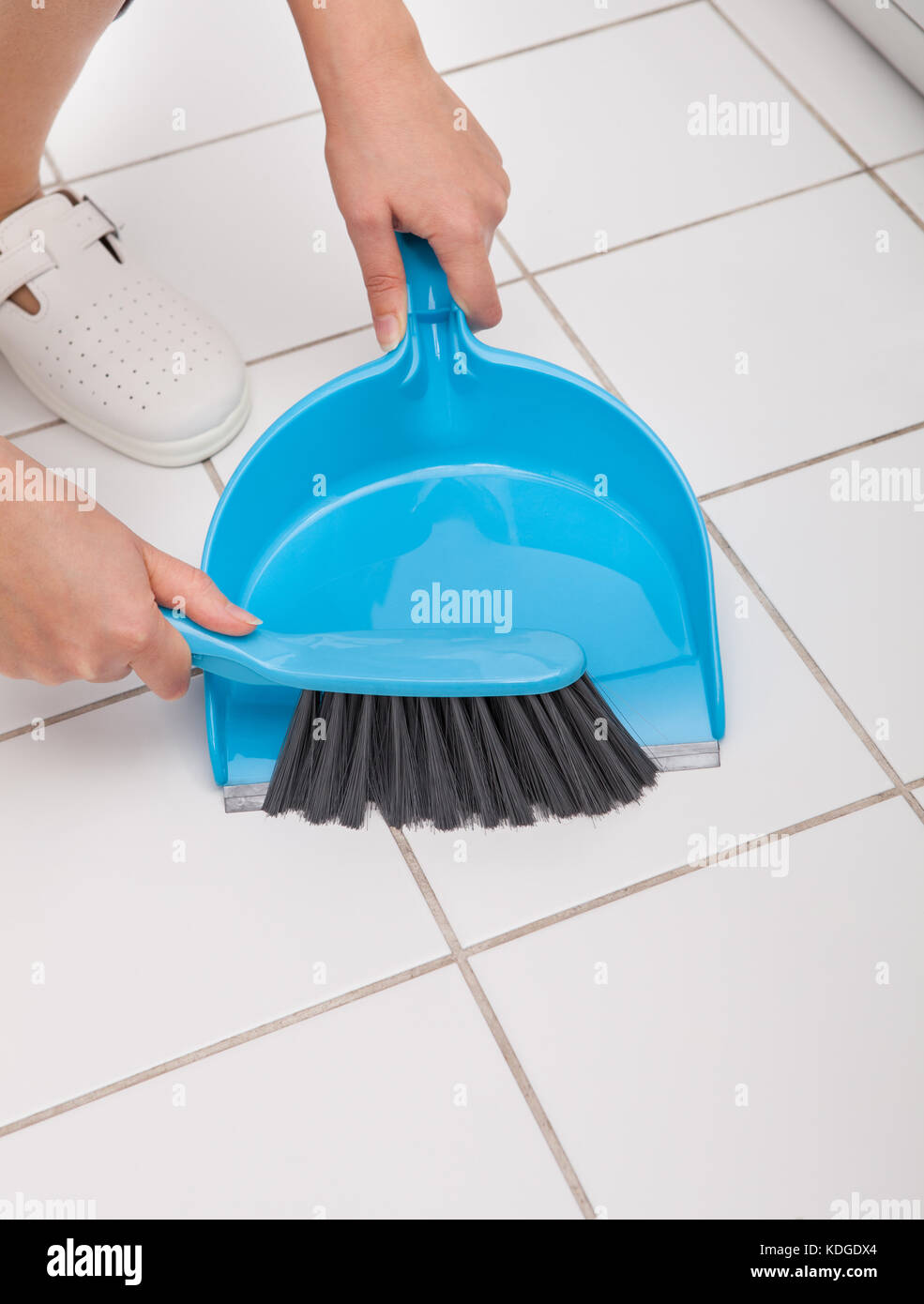 Close-up Of Woman Cleaning Floor With Broom And Dust Pan Stock Photo ...