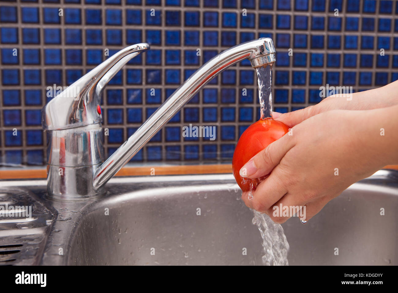 People under falling water hi-res stock photography and images - Alamy
