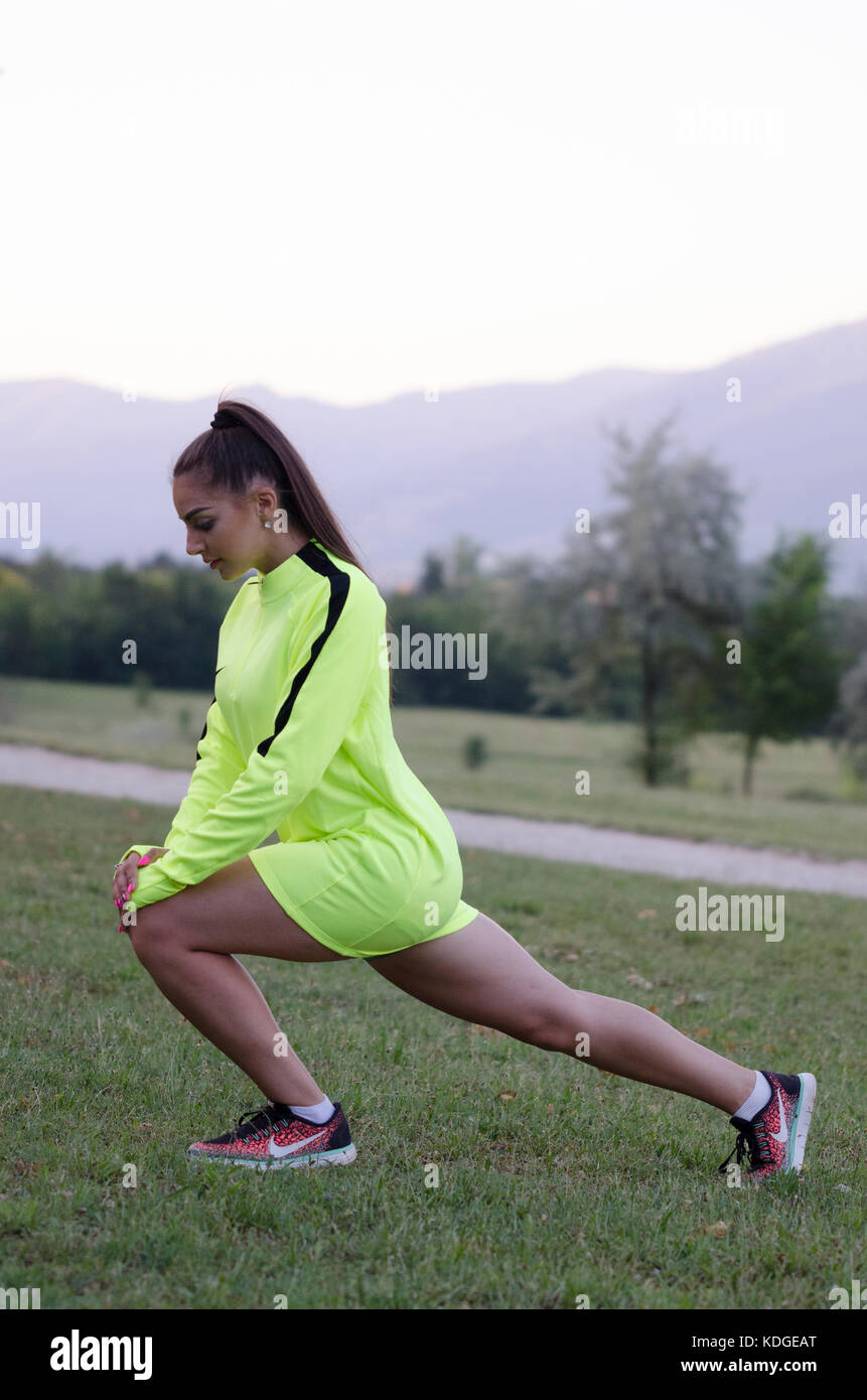 Female makes fitness exercises Stock Photo - Alamy
