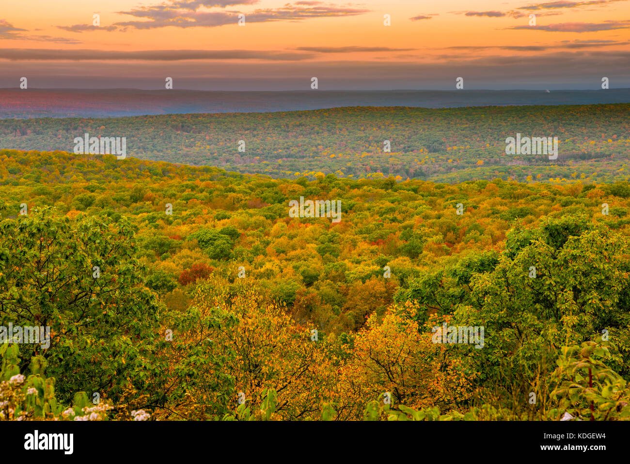 Beautiful sunrise in autumn. Colorful mountain foliage background Stock ...