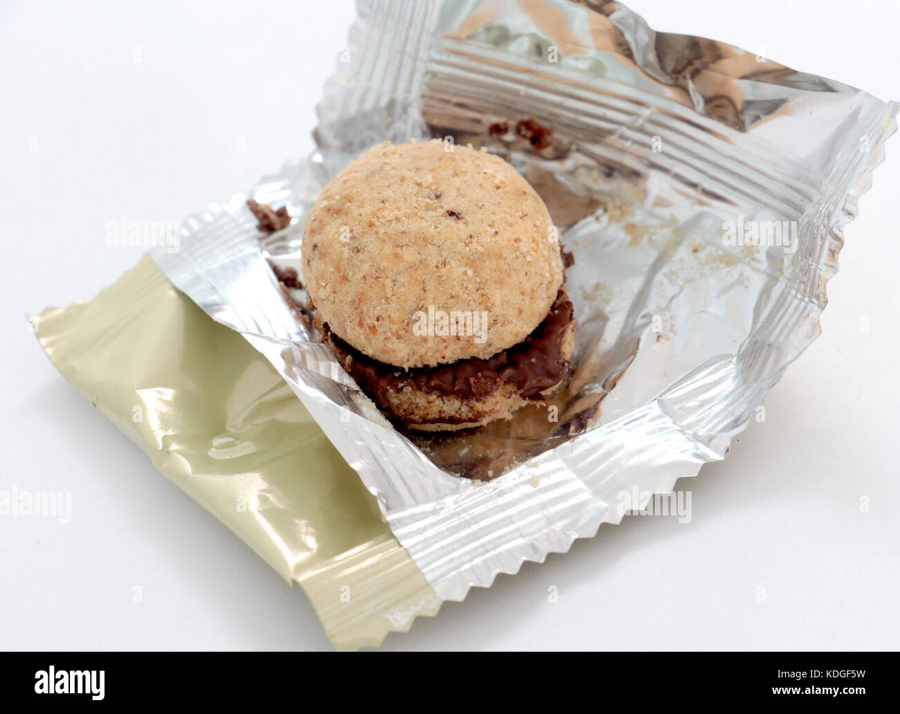 unwrapped cookie with chocolate fill in an open packaging Stock Photo ...