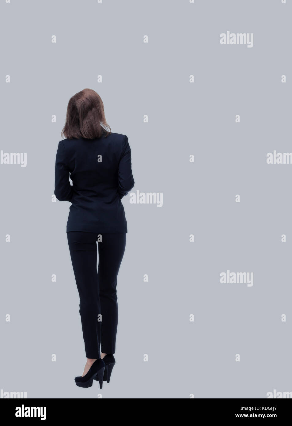 Business woman stand back side with white wall background Stock Photo ...