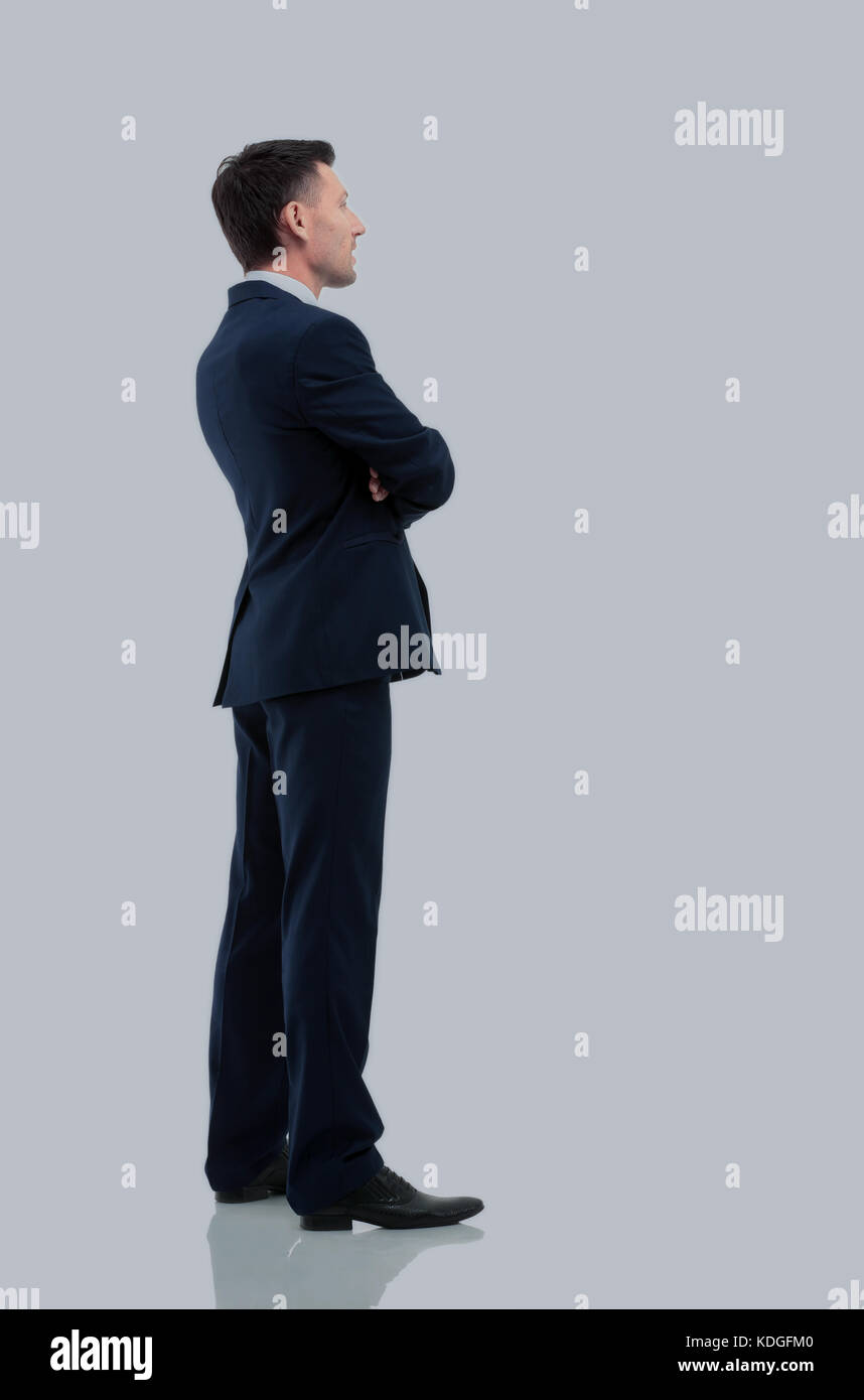 Side view of a smiling businessman, On white background Stock Photo - Alamy
