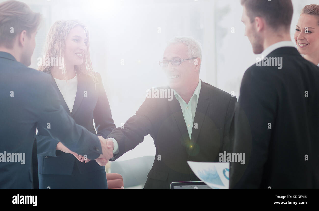 Business partners shaking hands after a successful transaction Stock ...