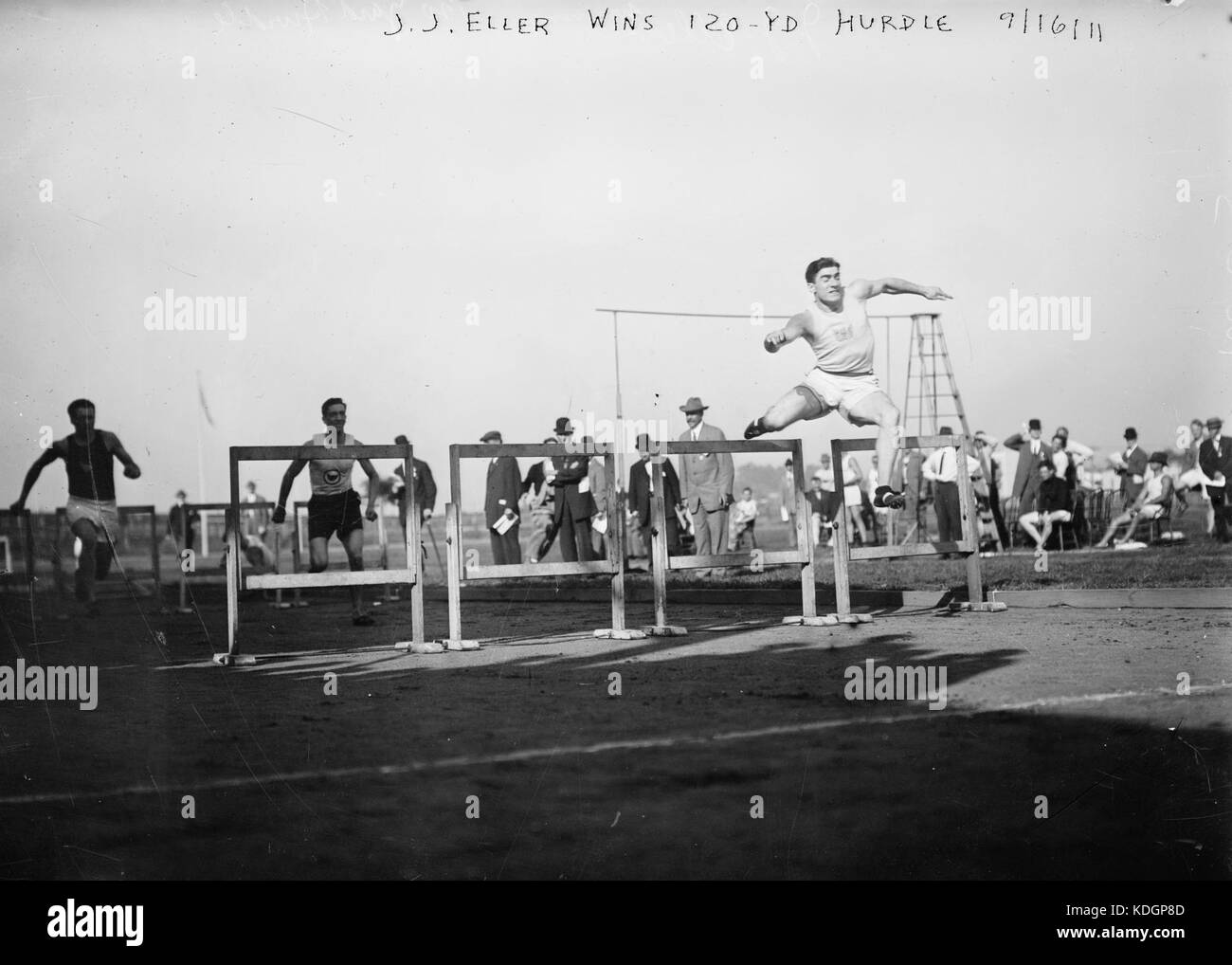 J.J. Eller wins 120 yd hurdle 9 16 11 Stock Photo - Alamy