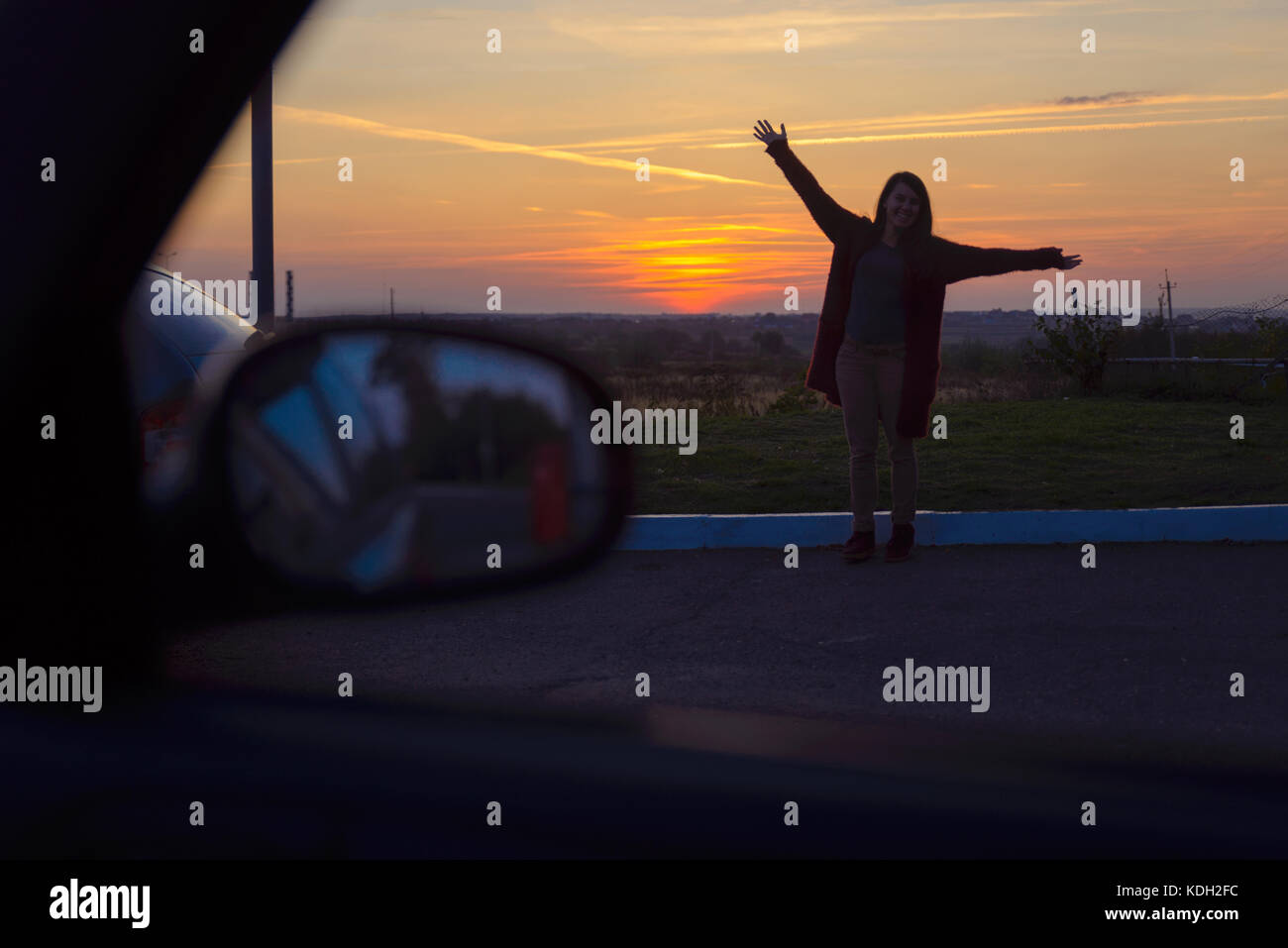 Woman stretching car hi-res stock photography and images - Alamy