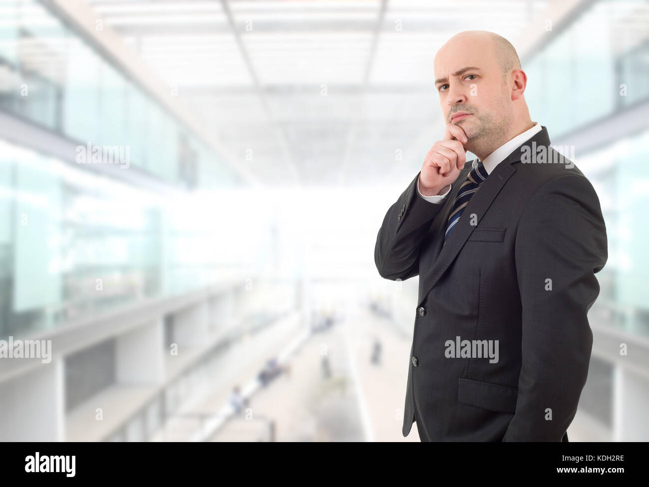 young business man thinking, at the office Stock Photo - Alamy