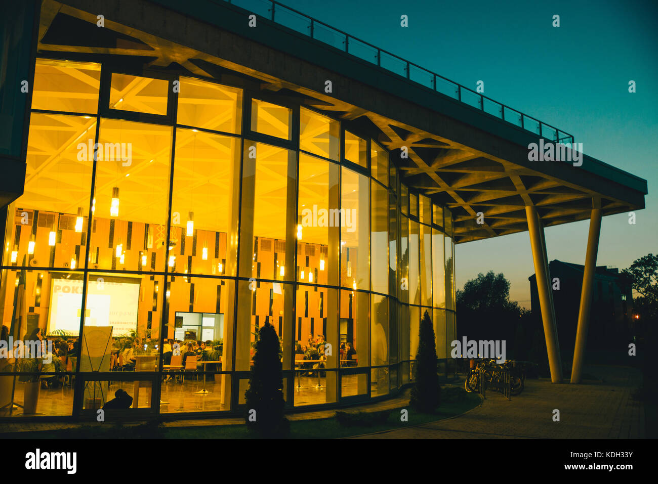 light in glass building at night Stock Photo - Alamy