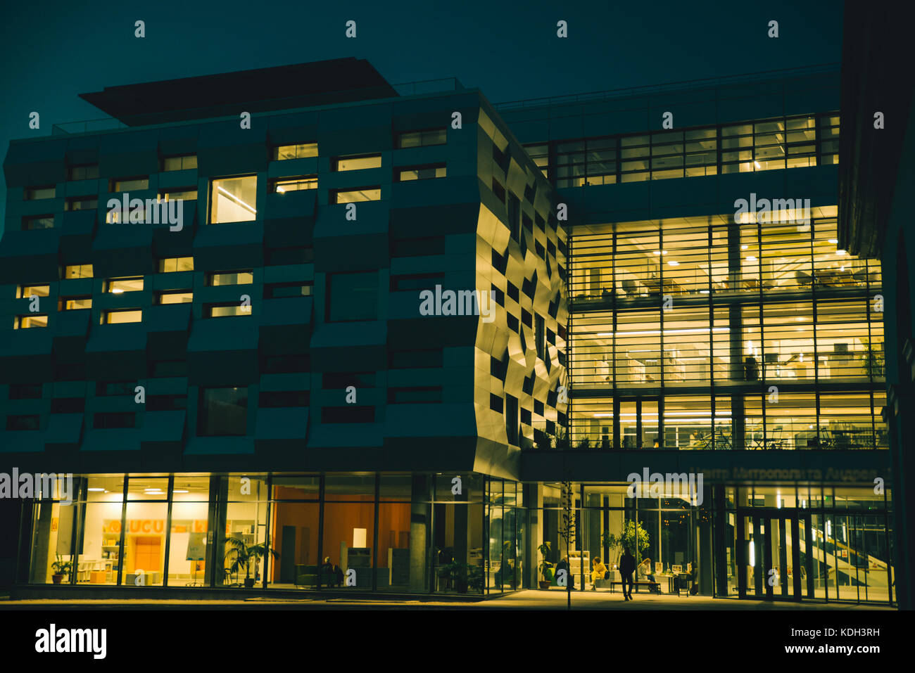 light in glass building at night Stock Photo - Alamy