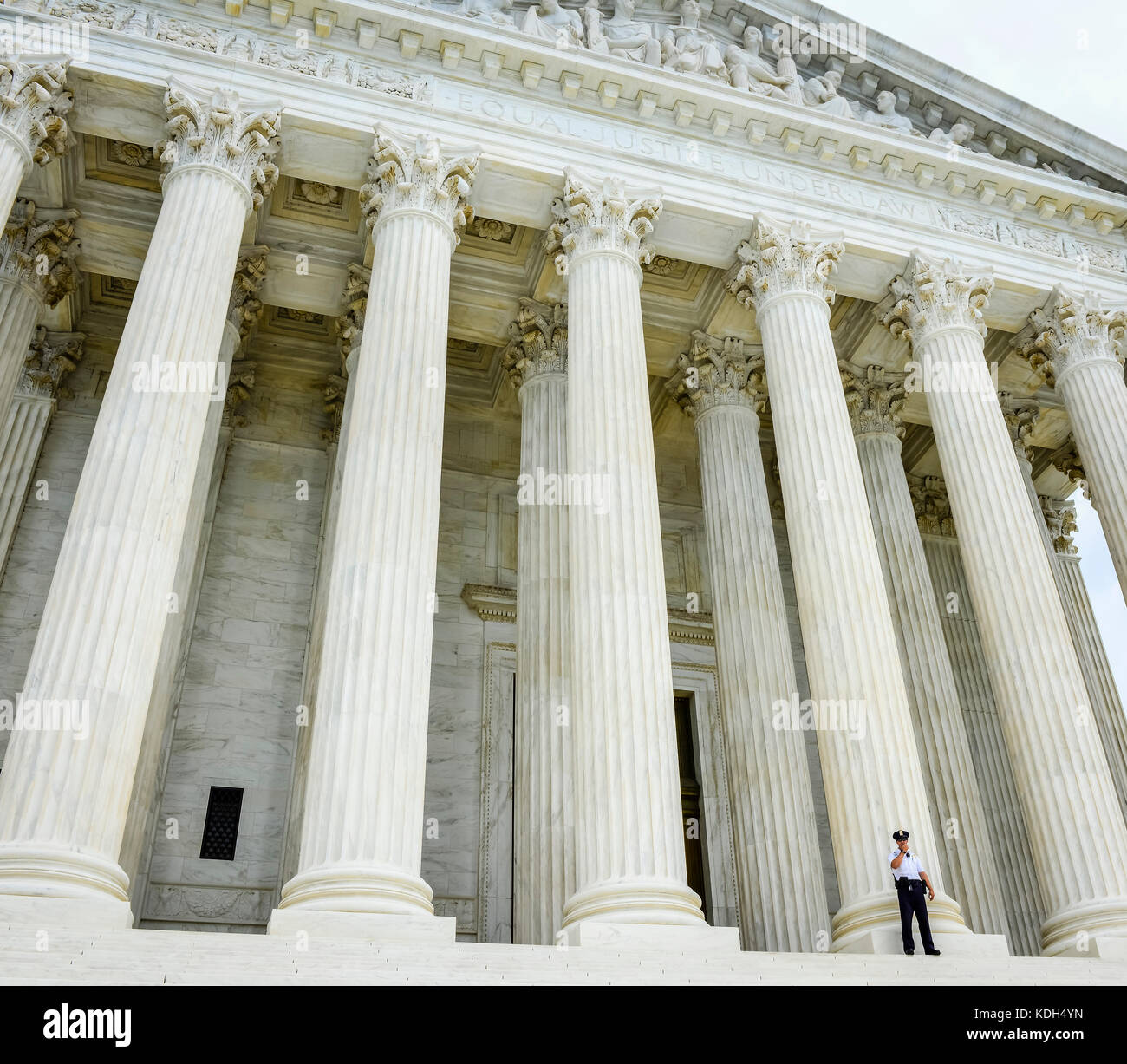 A lone security guard in front of the entrace to the majestic US ...
