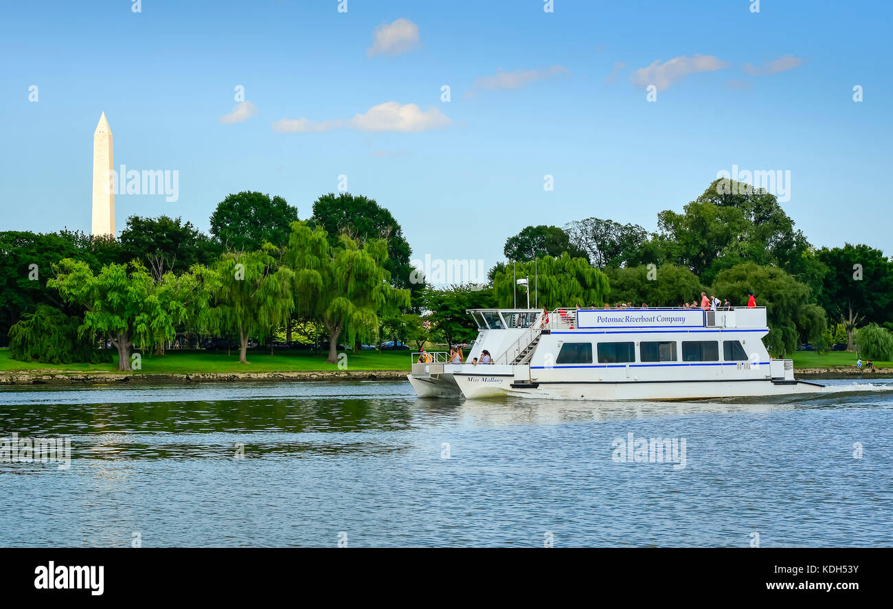 A riverboat cruises on the Potomac River with sightseeing tourists on ...