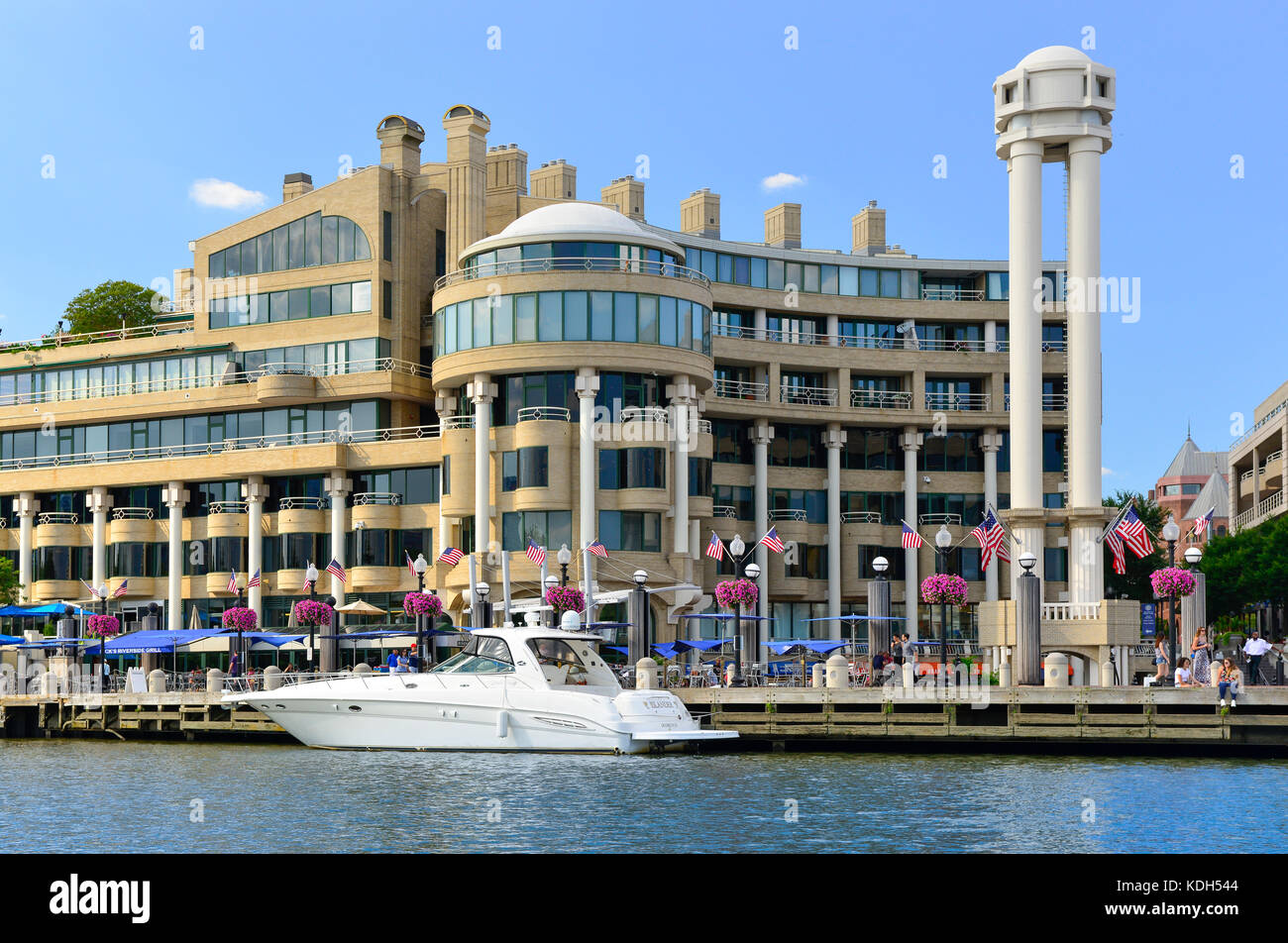 Power boat docked along side the Washington Harbor mixed use ...