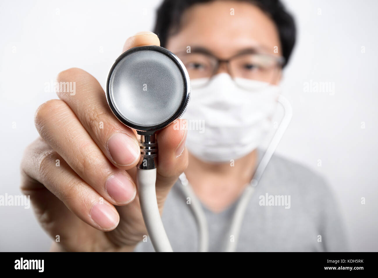 Family doctor health check Stock Photo - Alamy