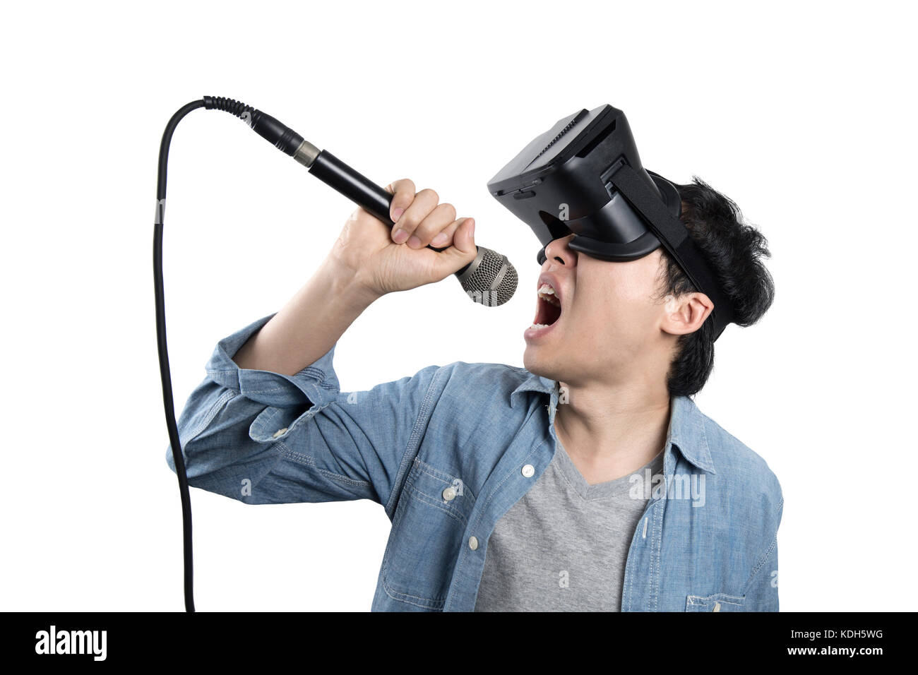 Asian man singing karaoke hi-res stock photography and images - Alamy