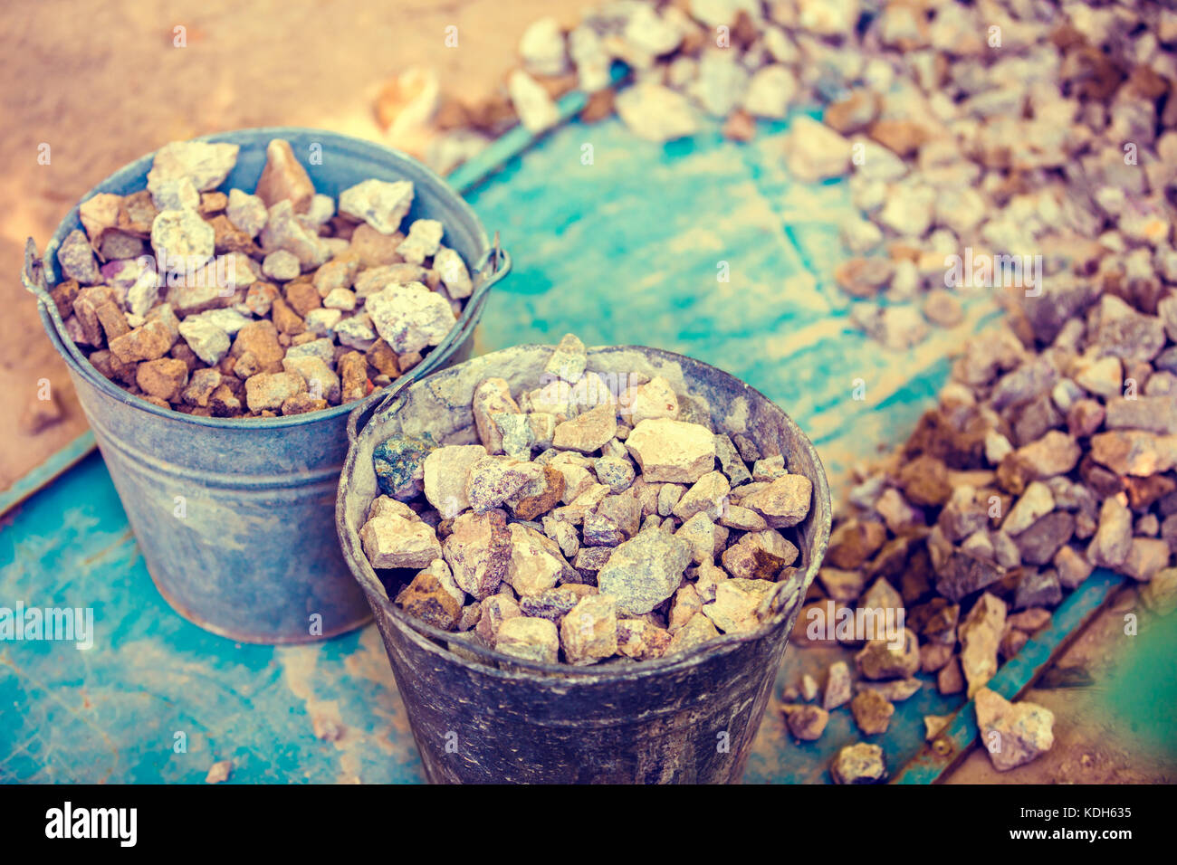 Buckets of gravel on the construction site Stock Photo - Alamy