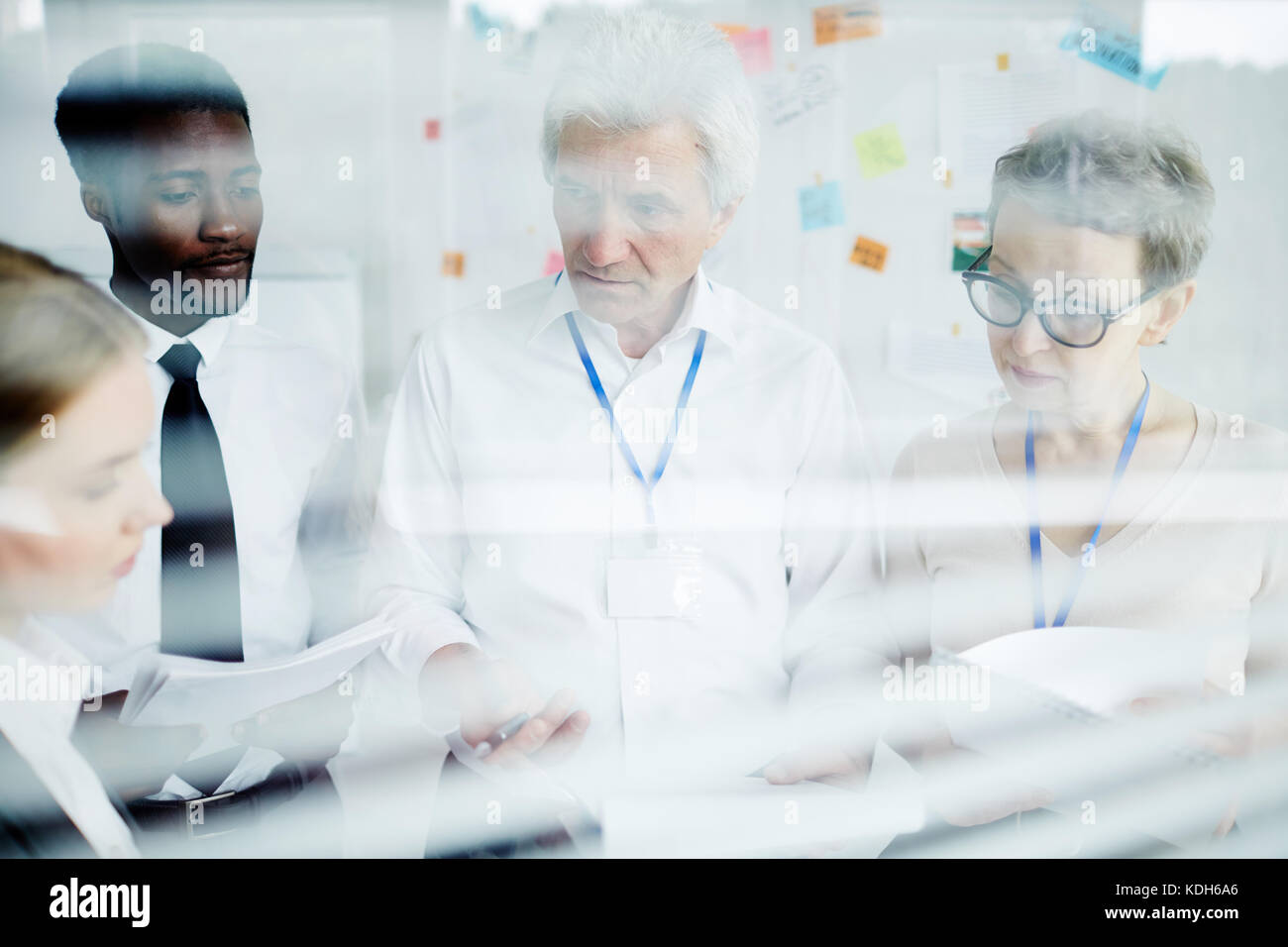 Team of successful investigators discussing new crime in office Stock ...