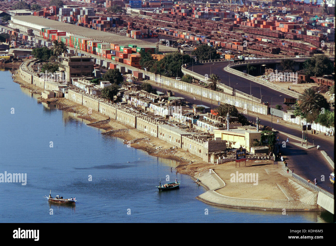 Port area of Karachi, Pakistan, with shipping containers and boats on ...