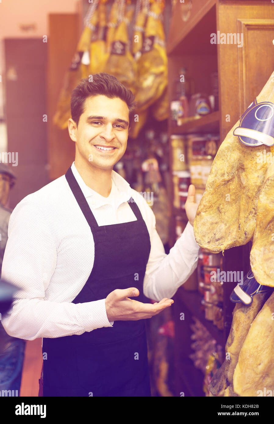 Smiling latina store worker hi-res stock photography and images - Alamy