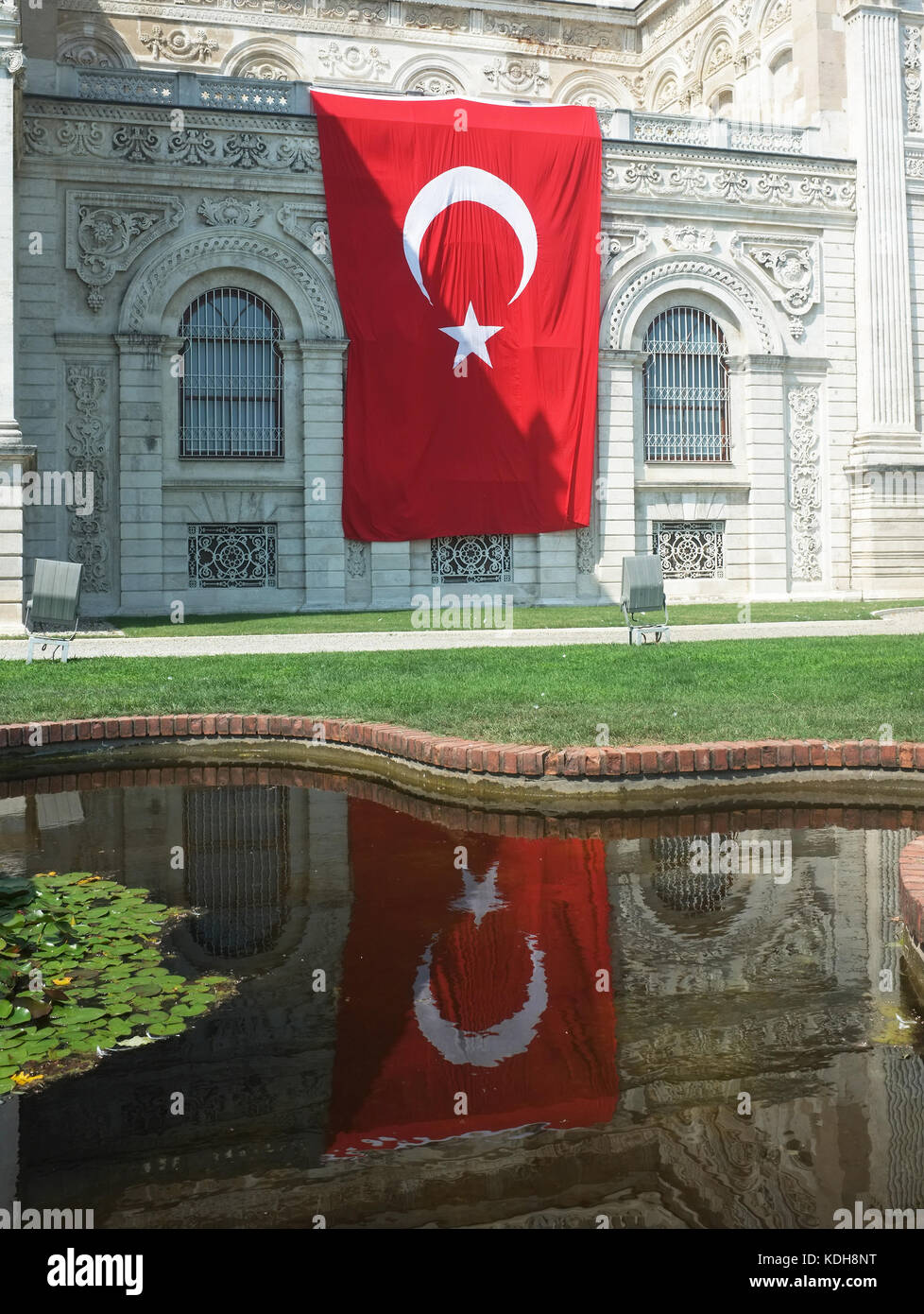 Giant Turkish flag hanging on the wall of Dolmabahce Palace in Istanbul ...
