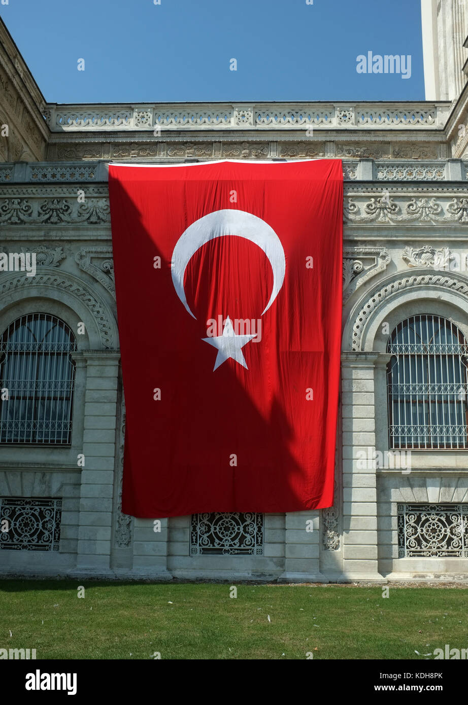 Giant Turkish flag hanging on the wall of Dolmabahce Palace in Istanbul ...