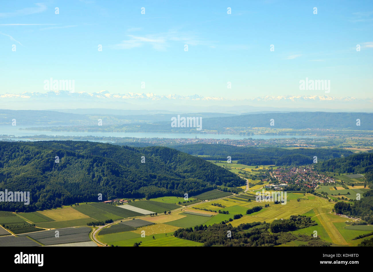 Aerial view of Lake Constance with Alps in background on a sunny summer ...