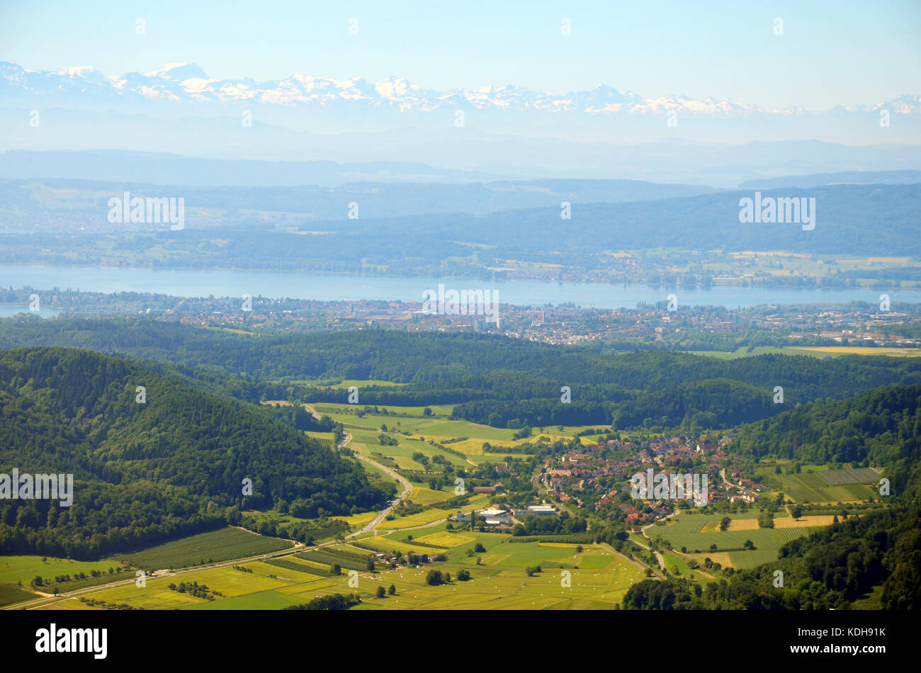 Aerial view of Lake Constance with Alps in background on a sunny summer ...