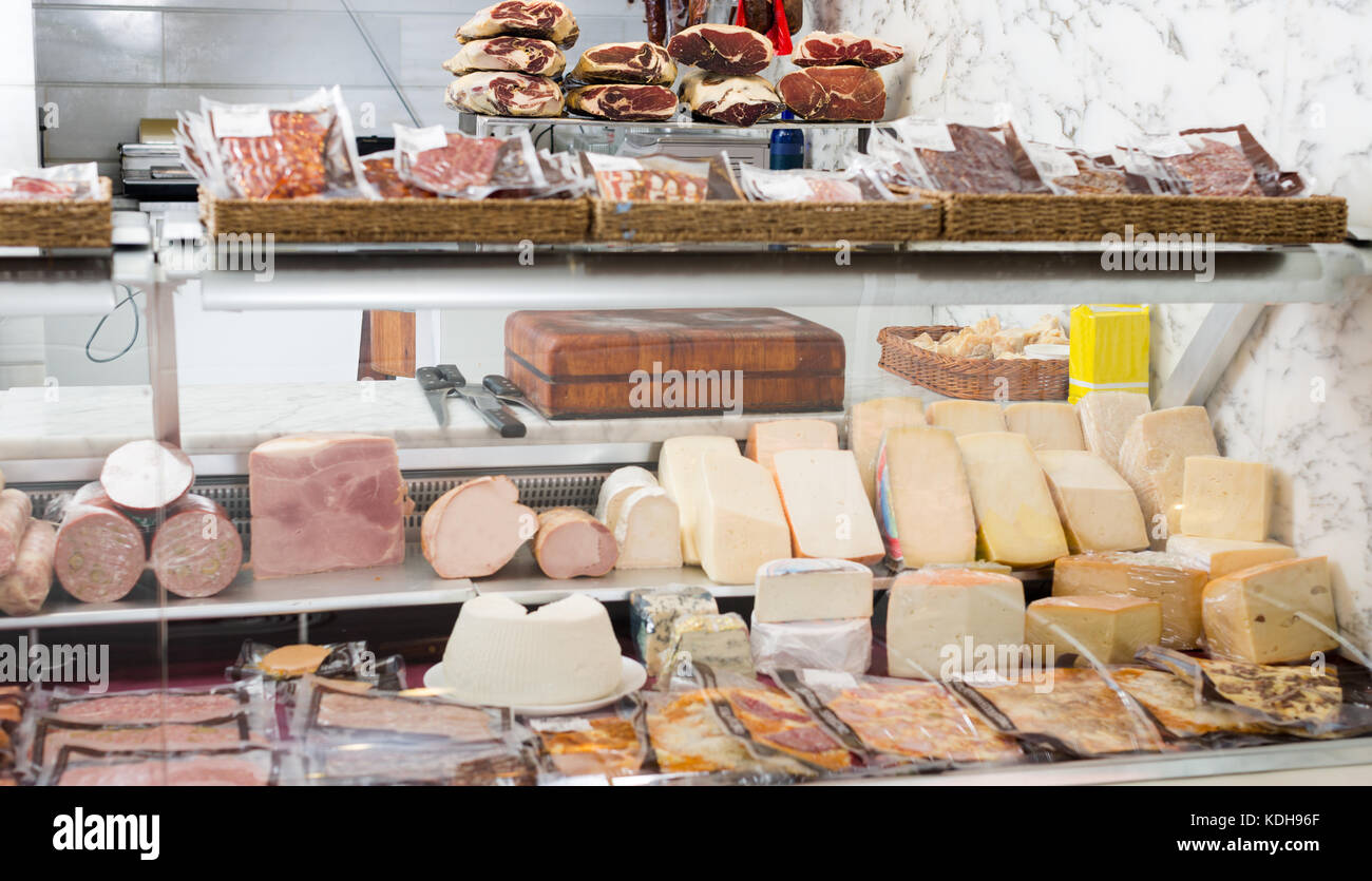 Cheese assortment on market to choose and bye Stock Photo - Alamy
