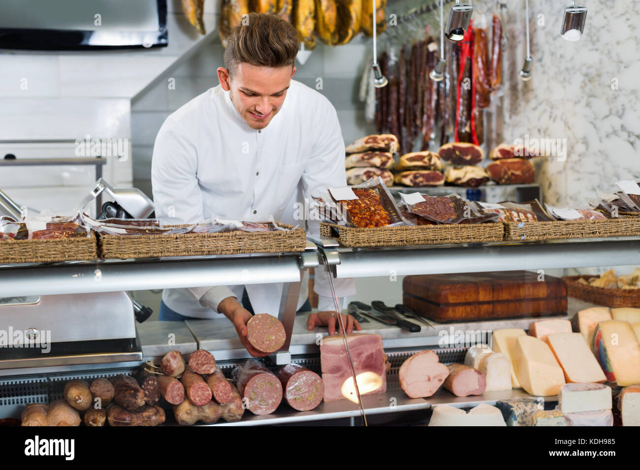 Male shop assistant welcoming hi-res stock photography and images - Alamy