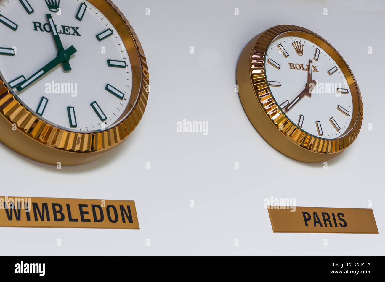 Wall golden clock at Wimbledon courts Stock Photo - Alamy