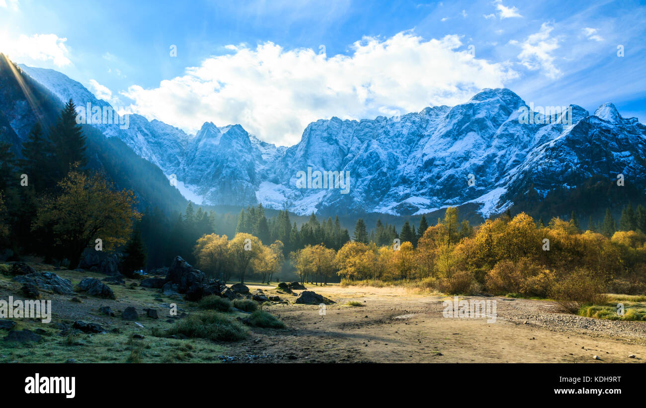 sun rise behind the peak in a colorful autumn morning Stock Photo - Alamy