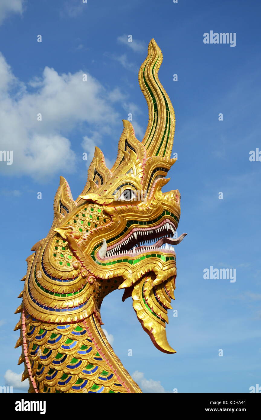 king of Naga statue in temple on sunny day Stock Photo - Alamy