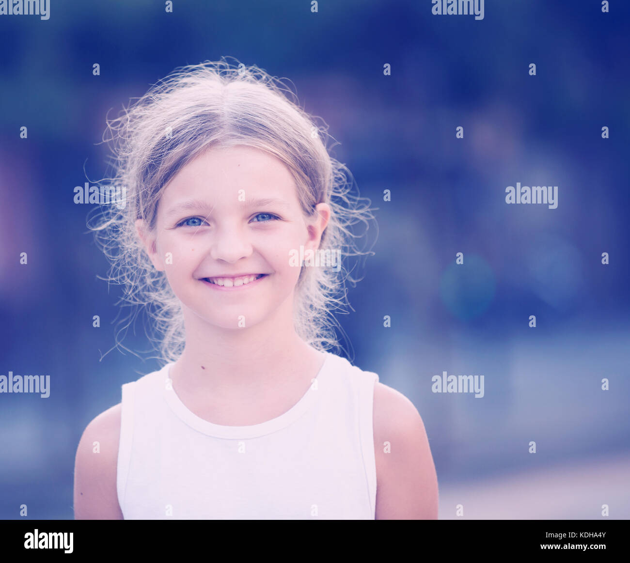closeup portrait of happy girl in elementary school age outdoors Stock ...