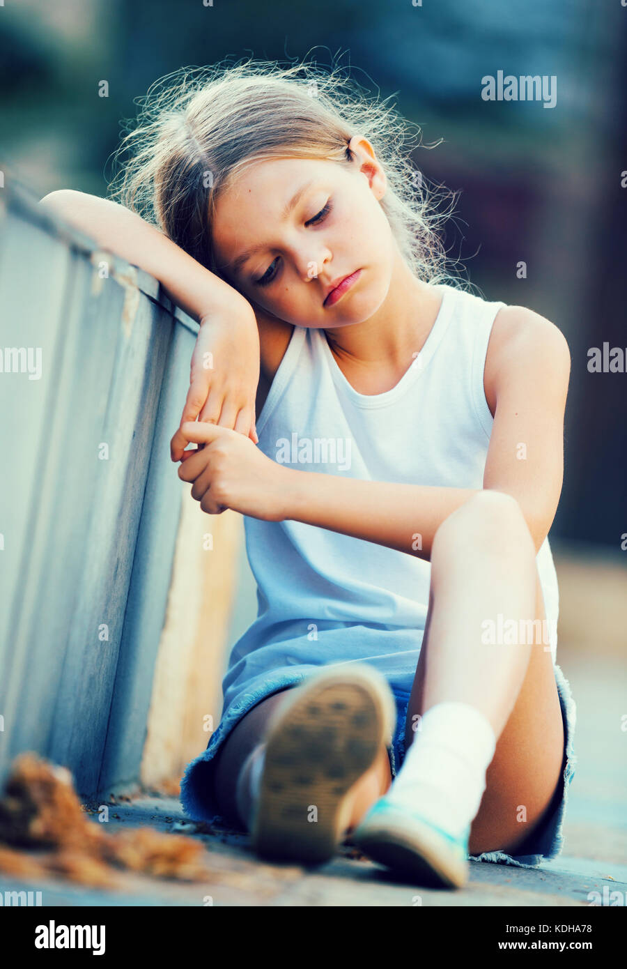 portrait of sad girl being alone and worried outdoors Stock Photo - Alamy
