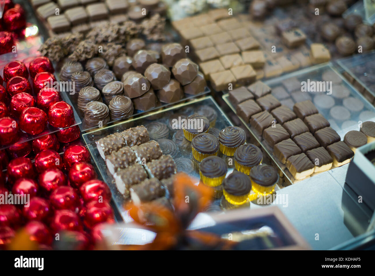 Collection of delicious chocolate candies with different fillings Stock ...