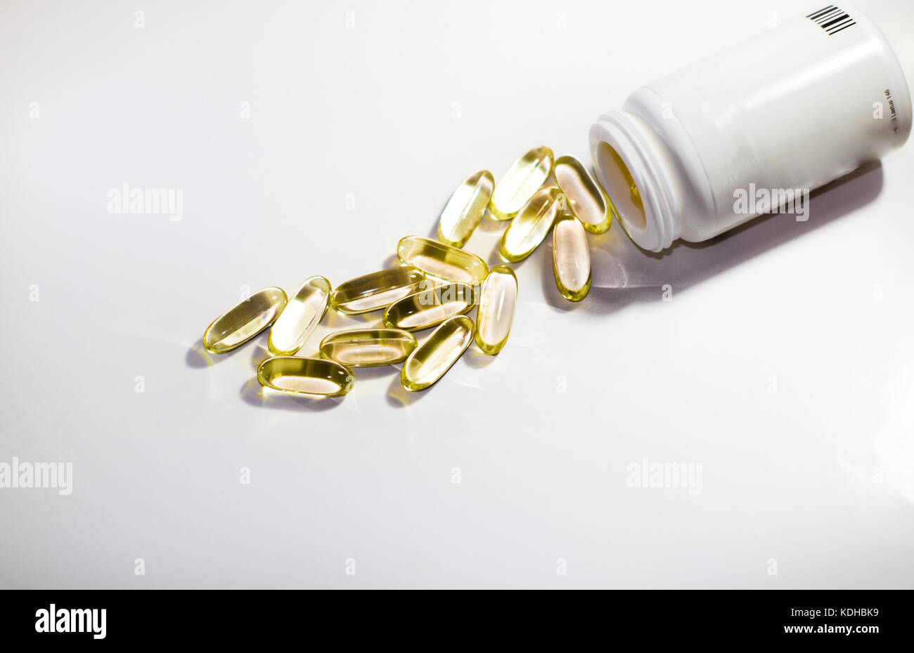 medication fish oil for heart health pills on a with background Stock ...