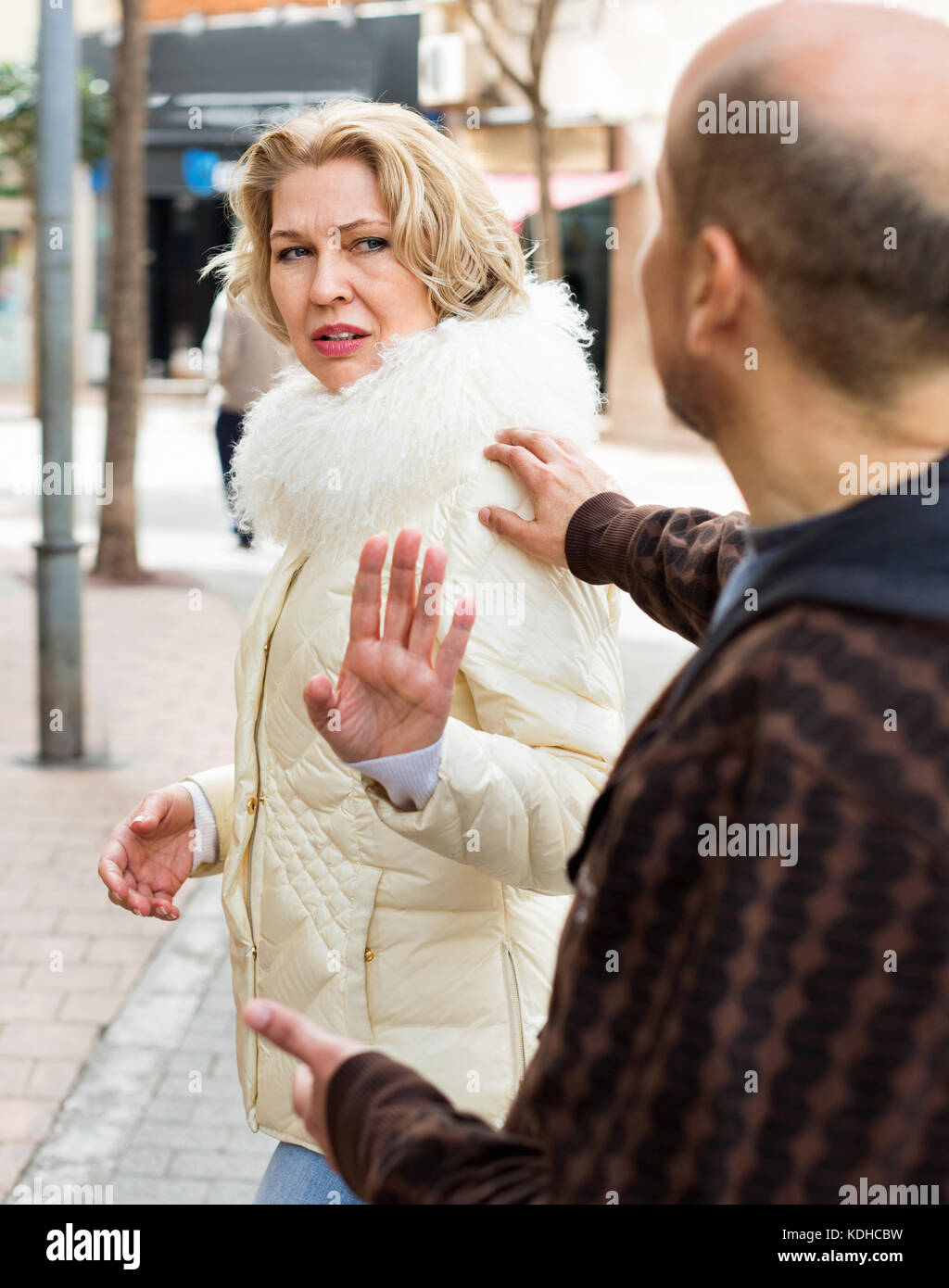Old man chasing woman hi-res stock photography and images - Alamy