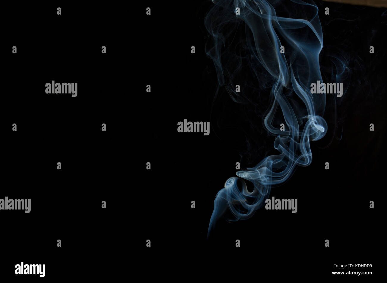 Incense Smoke on Black Background Stock Photo - Alamy