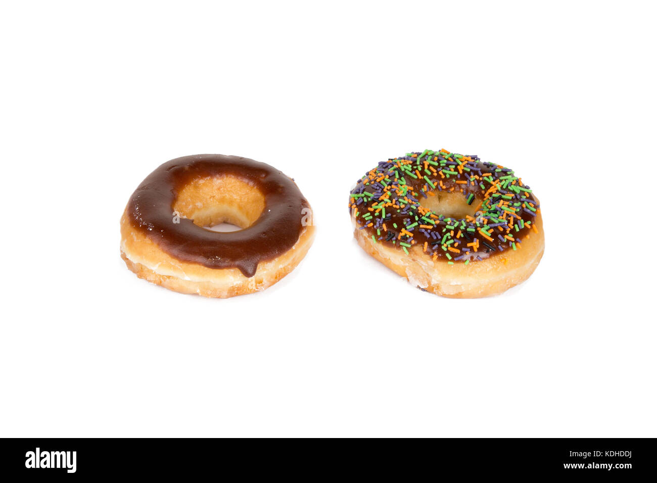 Close up detailed top view of yummy donuts with chocolate, powdered ...
