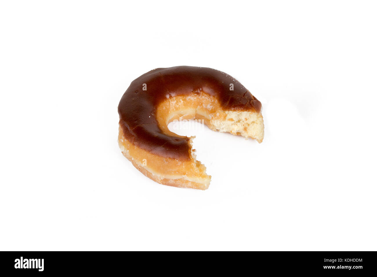 Close up detailed view of yummy bitten donut with chocolate, isolated ...