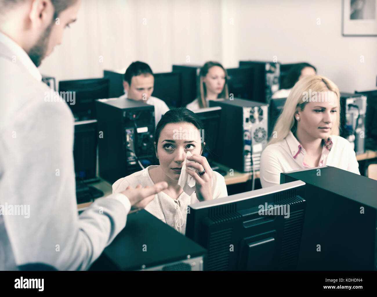 Furious supervisor scolding crying office worker Stock Photo - Alamy