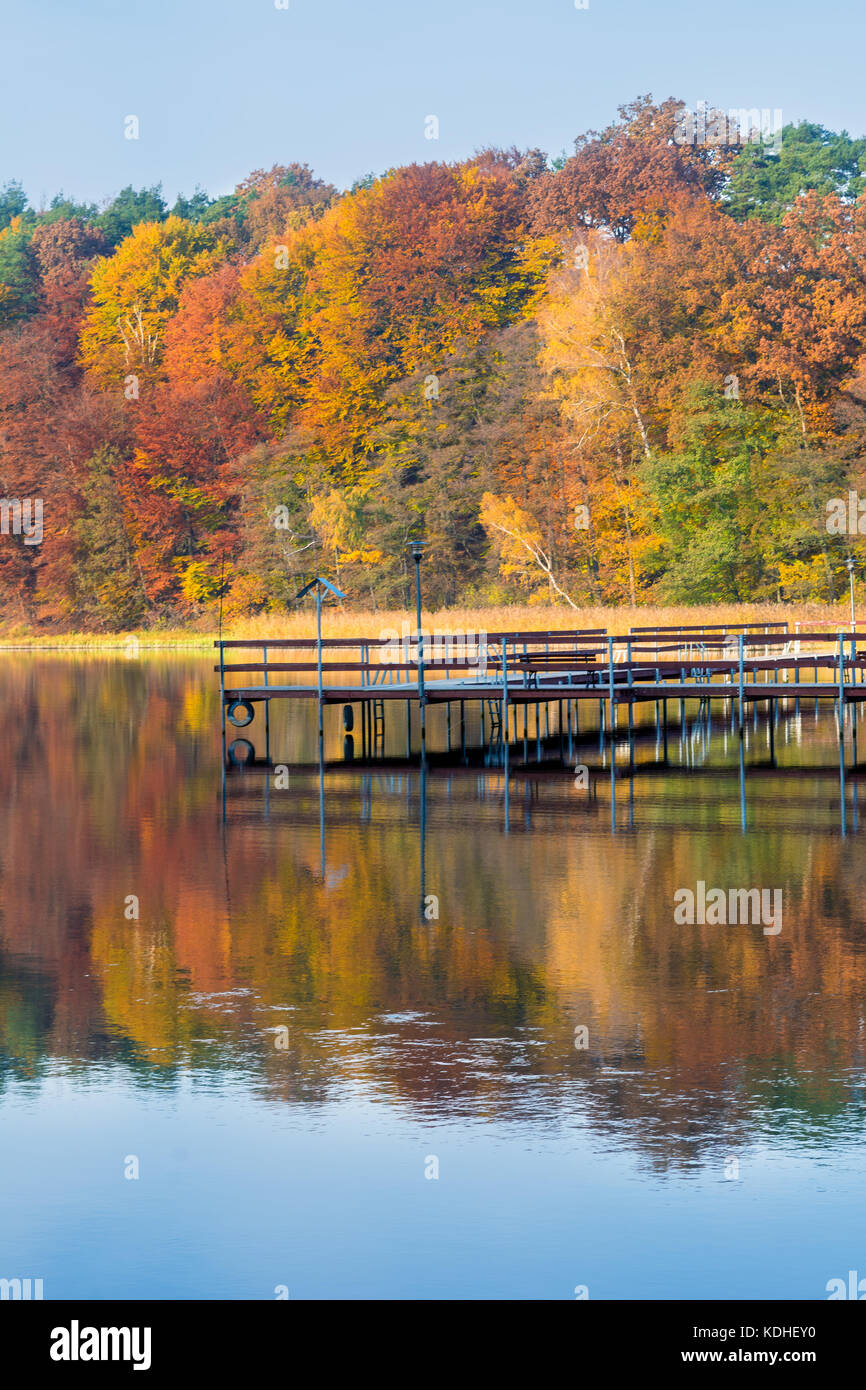 Boats on the lake shore Autumn landscape Stock Photo - Alamy