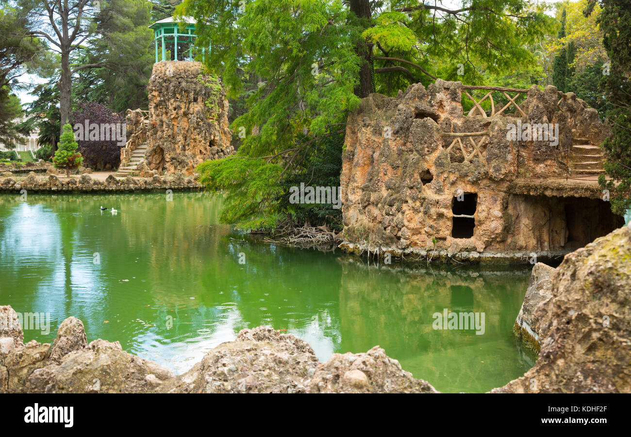 Peaceful view at pond with bridge and islands in Sama Park under blue ...