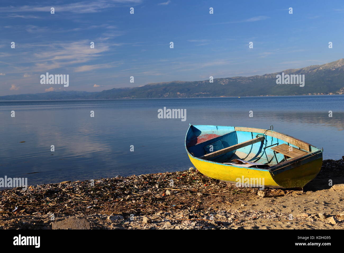 Wooden fishing boats moored on the beach of Lake Ohrid in Pogradec ...