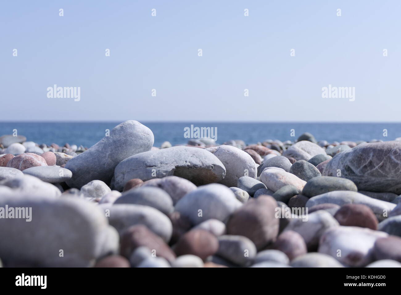 Beach rock and blue sea Stock Photo - Alamy