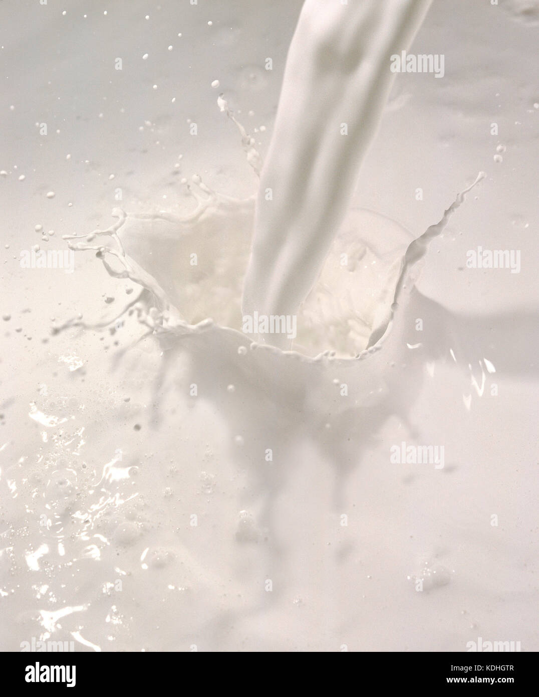 Still life. Food. Milk pouring splash Stock Photo - Alamy