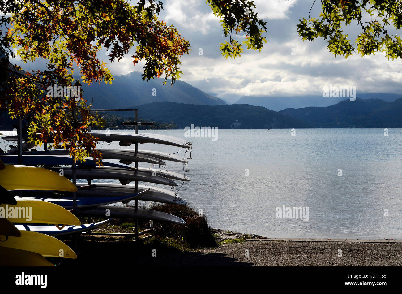Annecy lake autumn landscape, mountains, kayak and paddles Stock Photo ...