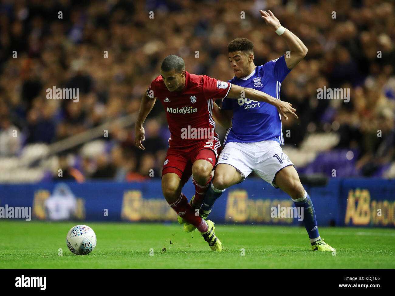 Cardiff City's Lee Peltier and Birmingham City's Che Adams (right ...