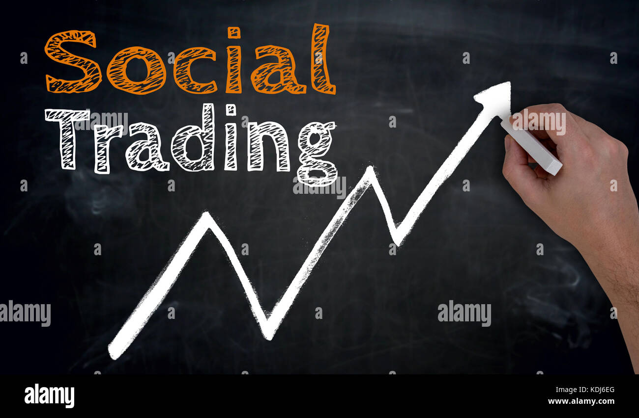 Social trading is written by hand on blackboard Stock Photo - Alamy