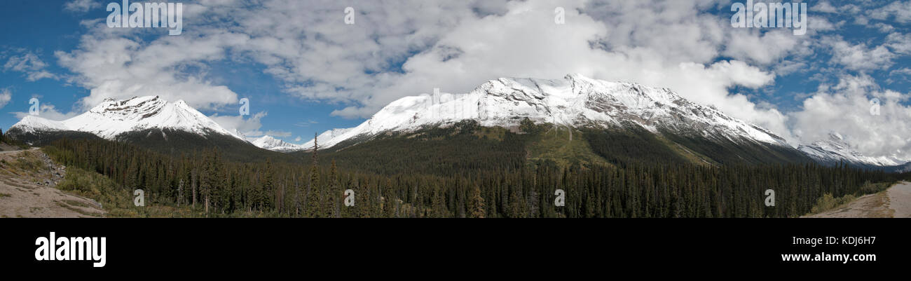 A panoramic view of snow covered mountains in Banff National Park in ...